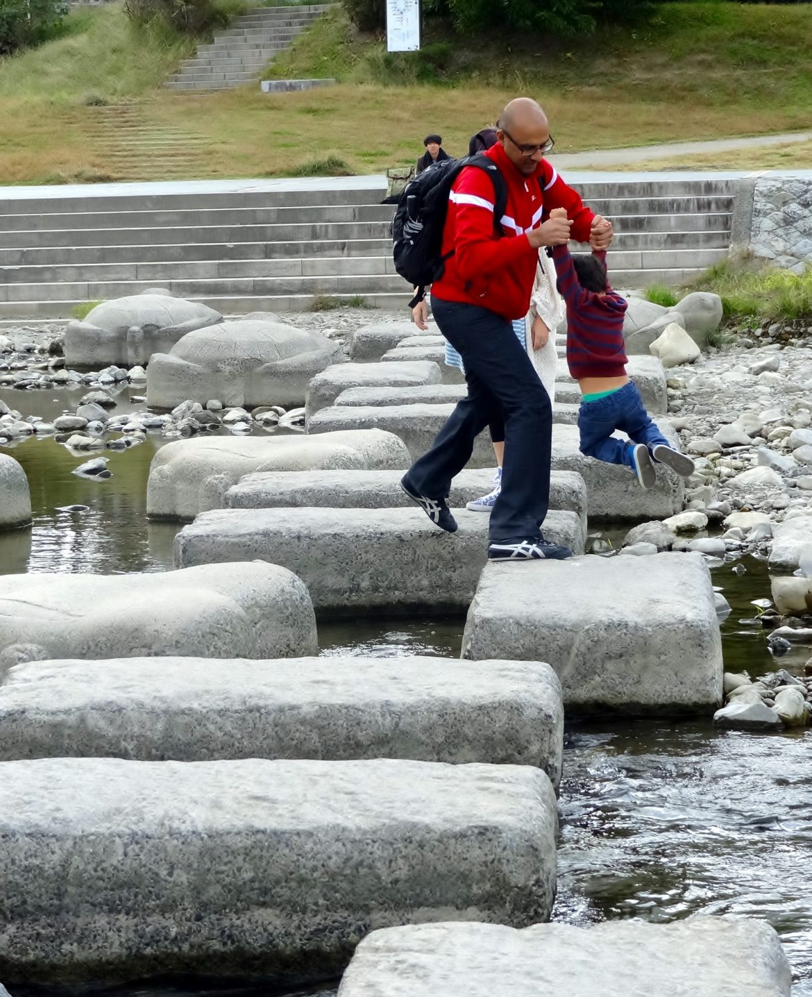 Jumping across the stepping stones in Kyoto | The Little Adventurer